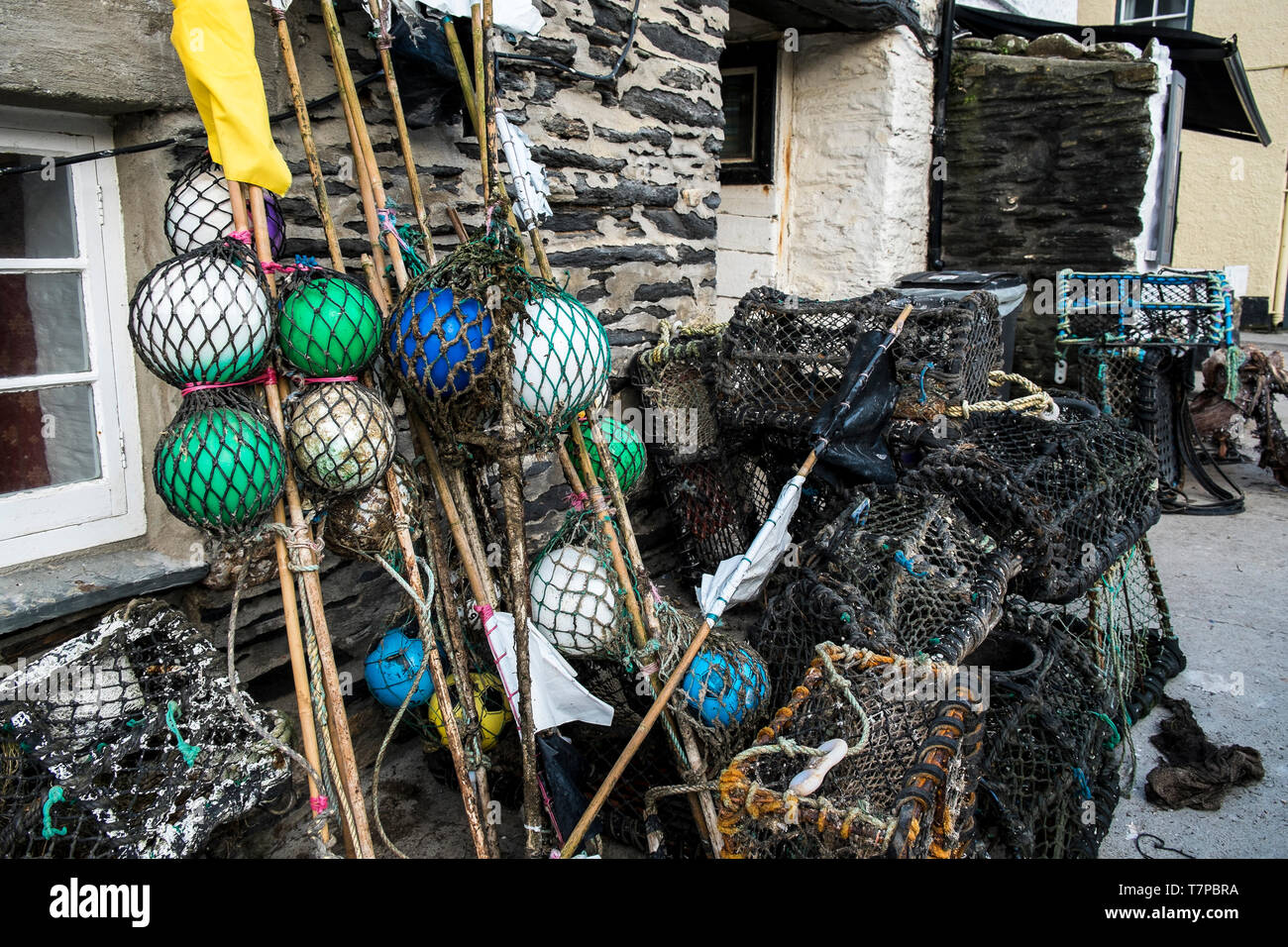Lobster pots and other fishing objects in Port Isaac, Cornwall Stock ...