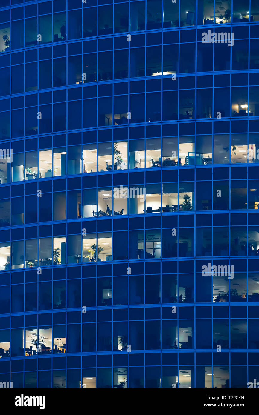 Modern high corporate building at night Stock Photo - Alamy