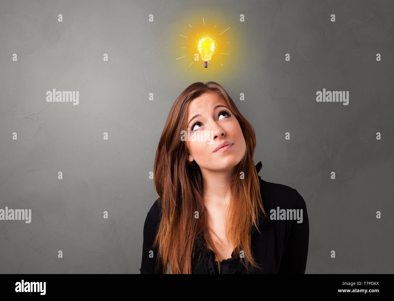 Young student looking for new idea with lighting bulb concept Stock ...