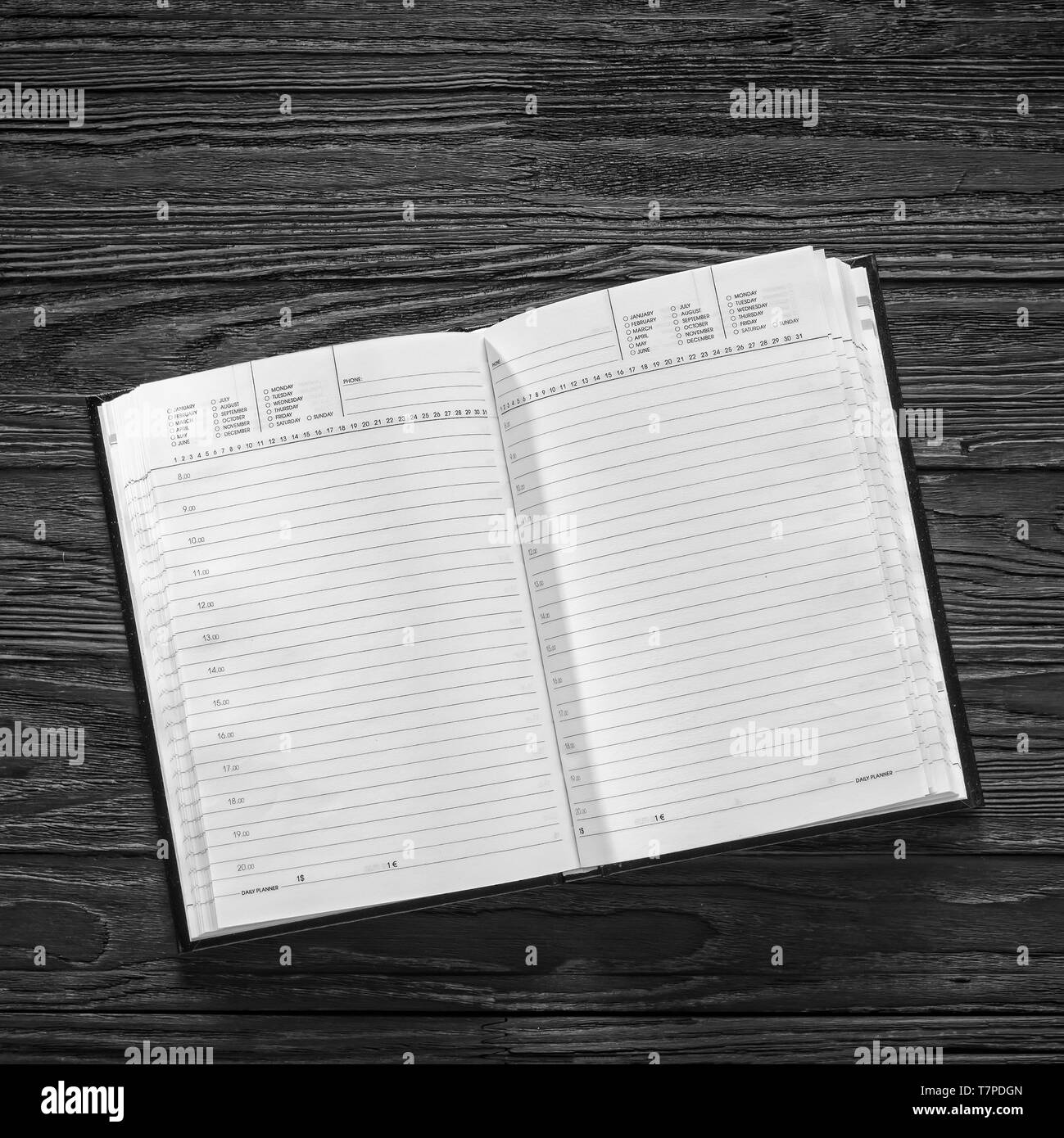 Open diary with blank pages on a wooden vintage table. Concept ...