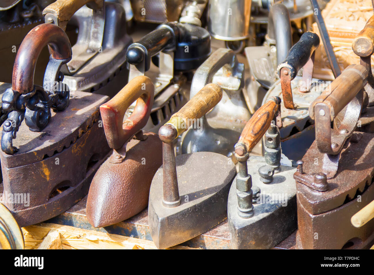 Old ancient metal irons.Retro iron Stock Photo - Alamy