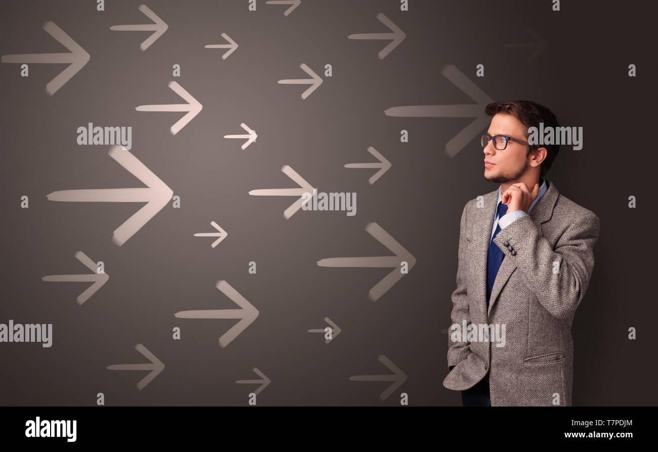 Young person thinking with direction concept background Stock Photo - Alamy