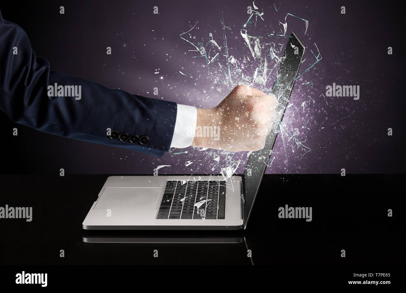 Hand hitting strongly laptop screen glass Stock Photo - Alamy