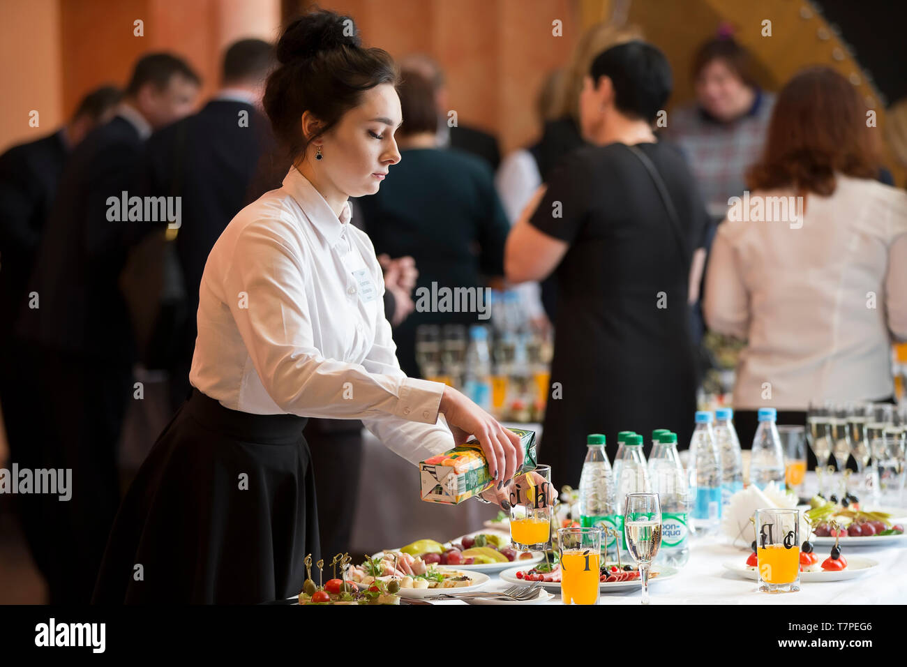 Waiter With Tray Of Food