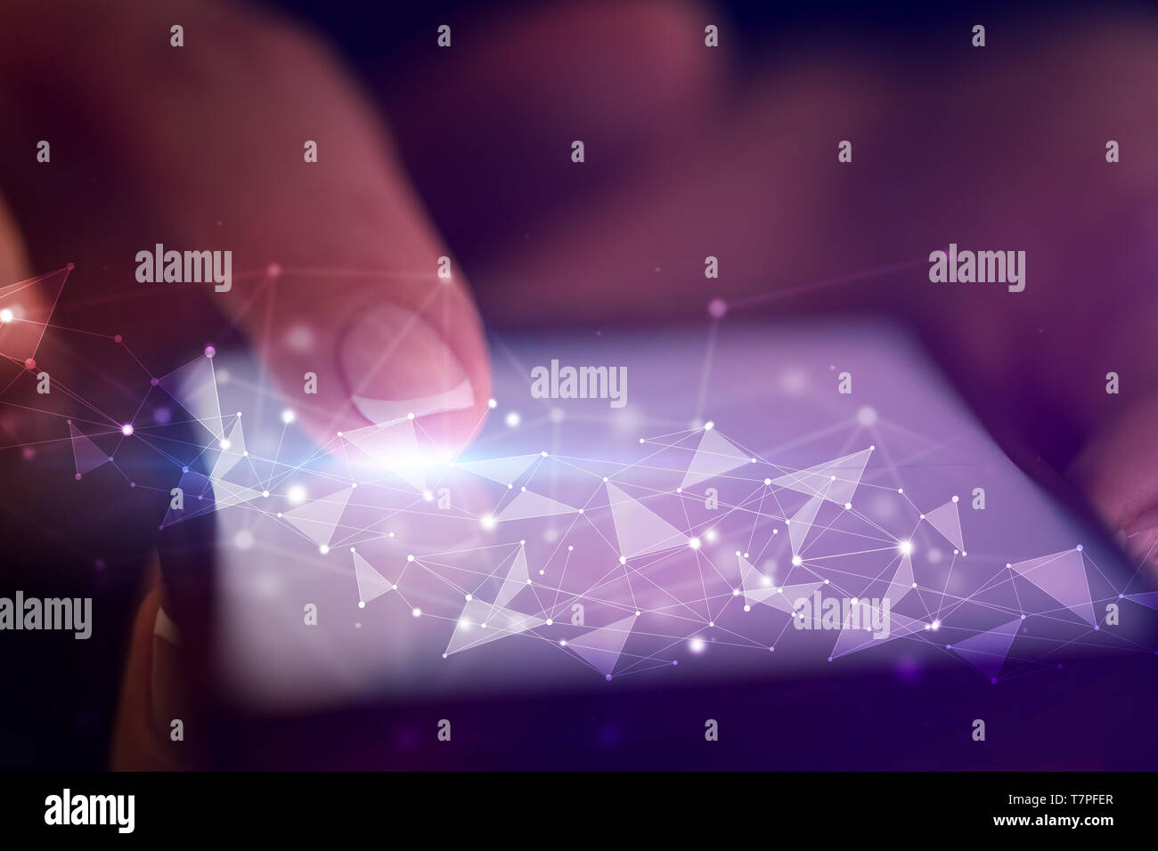 Finger touching phone with human network concept and dark background ...