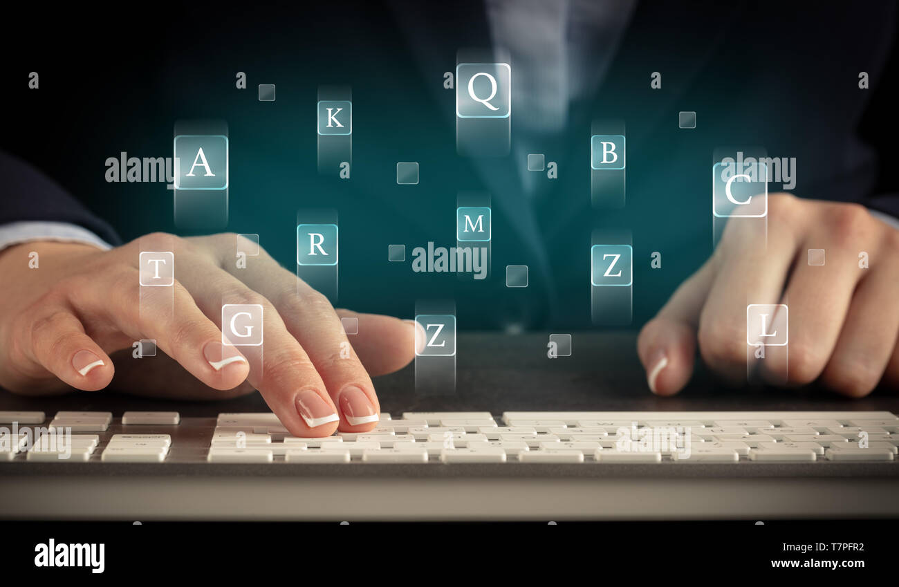 Business woman typing on keyboard with letters around Stock Photo - Alamy