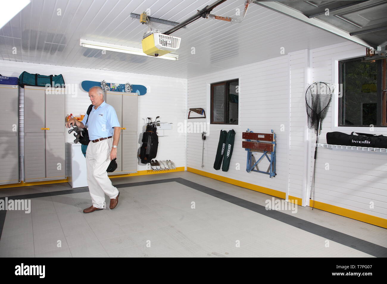 A domestic double garage fitted out with system-based storage ...