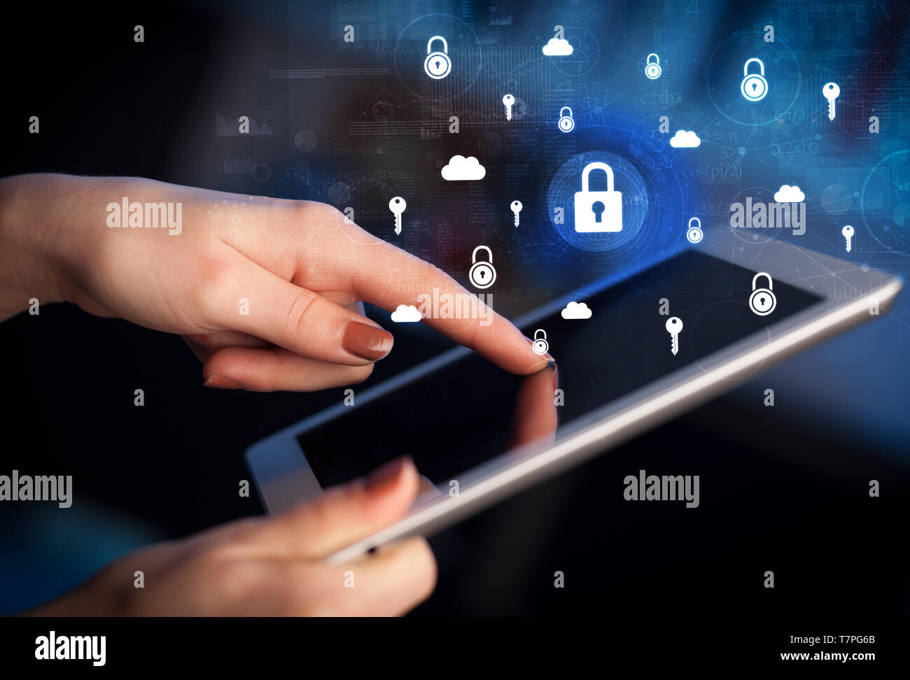Hand holding tablet with online security system concept Stock Photo - Alamy