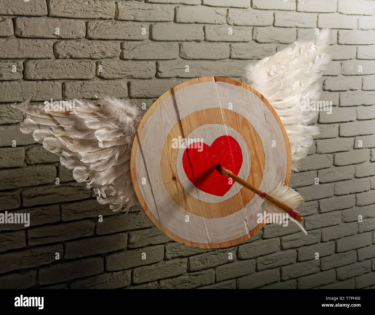Wings Target Heart Stock Photo - Alamy