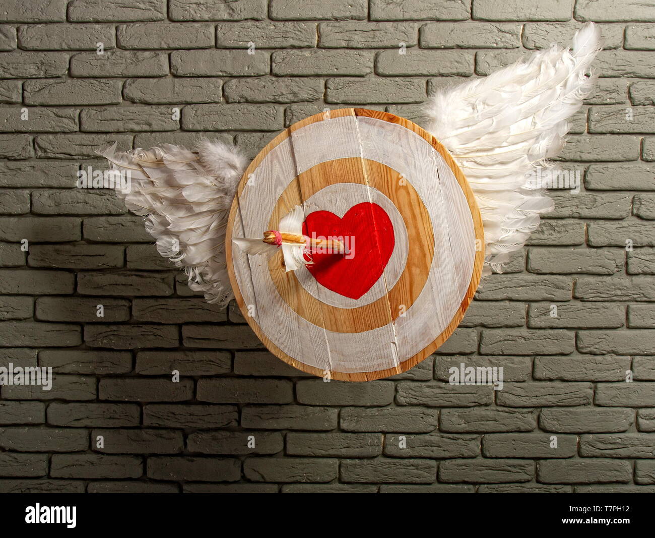 Wings Target Heart Stock Photo - Alamy