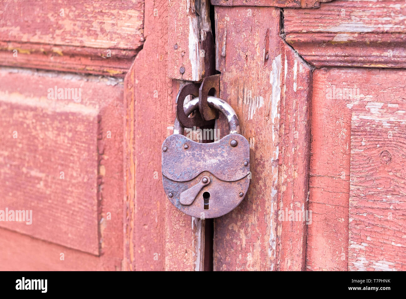 Closeup wooden door with lock Stock Photo - Alamy