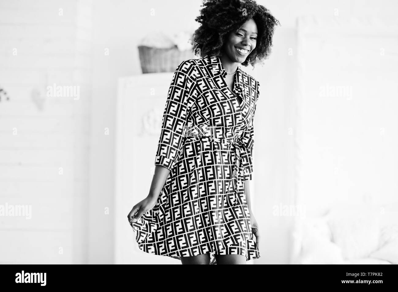 Fashionable tall african american model woman with red afro hair in ...