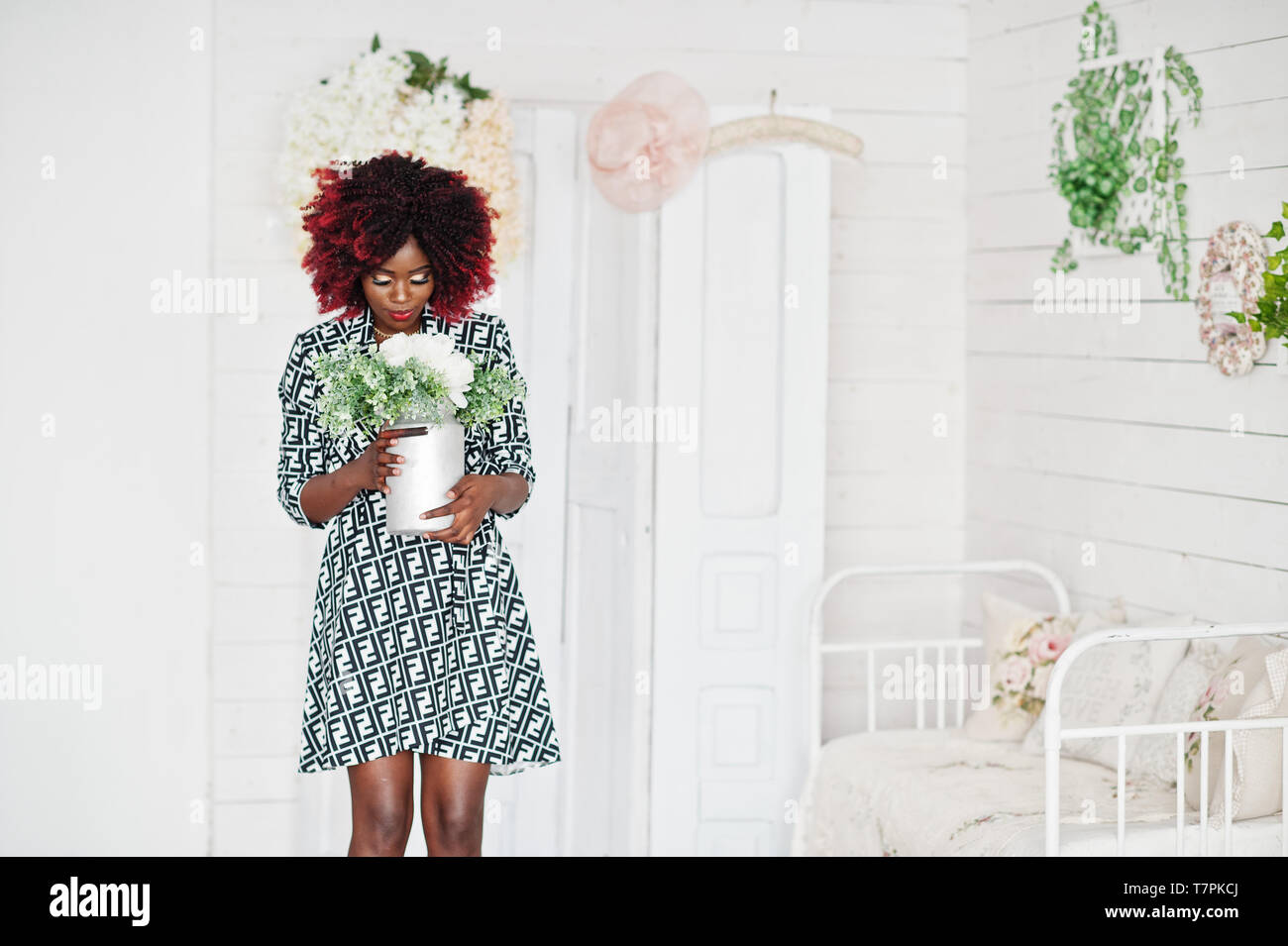 Fashionable tall african american model woman with red afro hair in ...