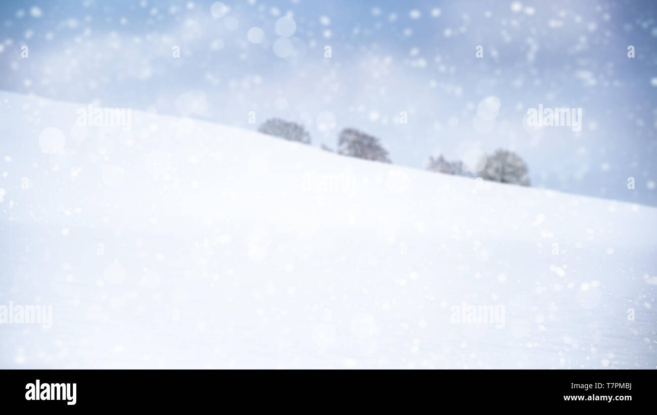 A beautiful snowy landscape with heavy snowfall. A hill in front of the ...
