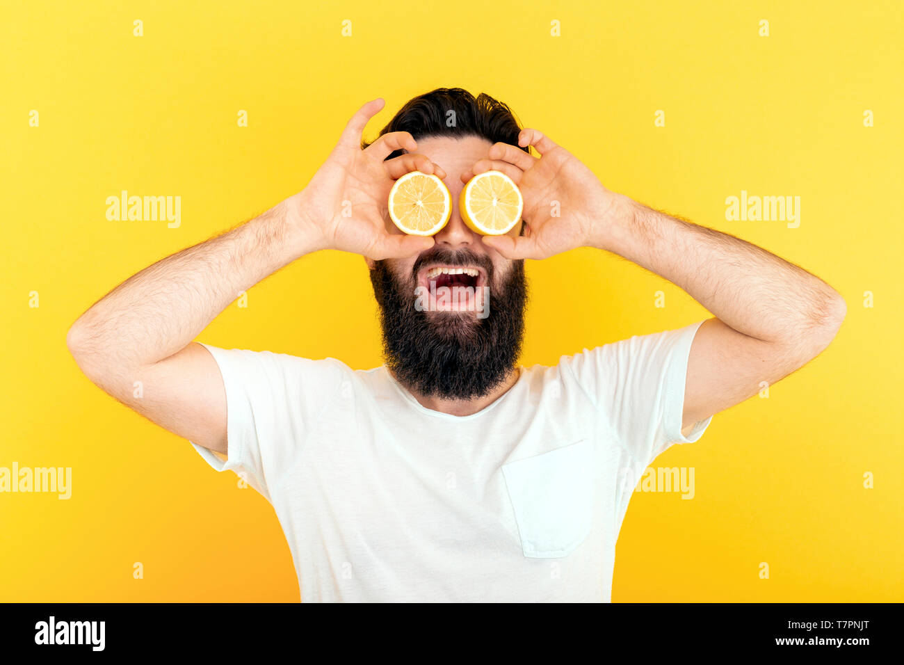Man holding object in front of face hi-res stock photography and images ...