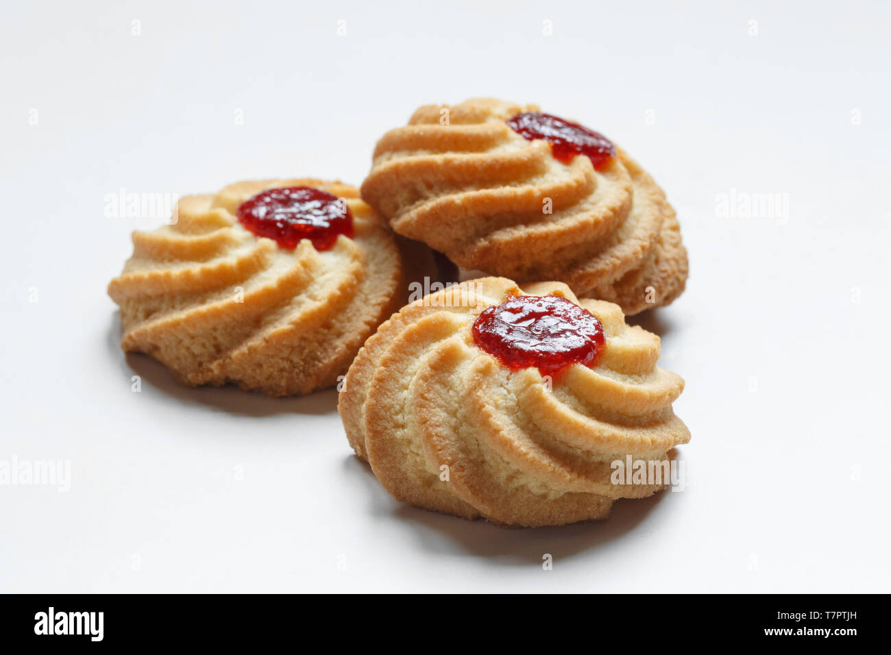 Close-up of three shortbread cookies isolated on white background Stock ...