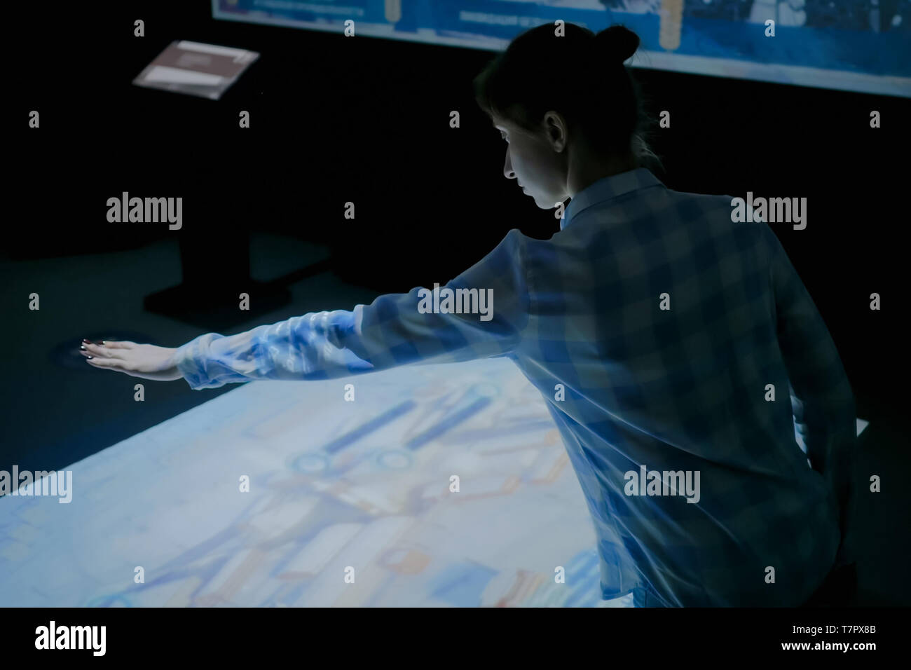 Woman using modern touchless hand hi-res stock photography and images ...