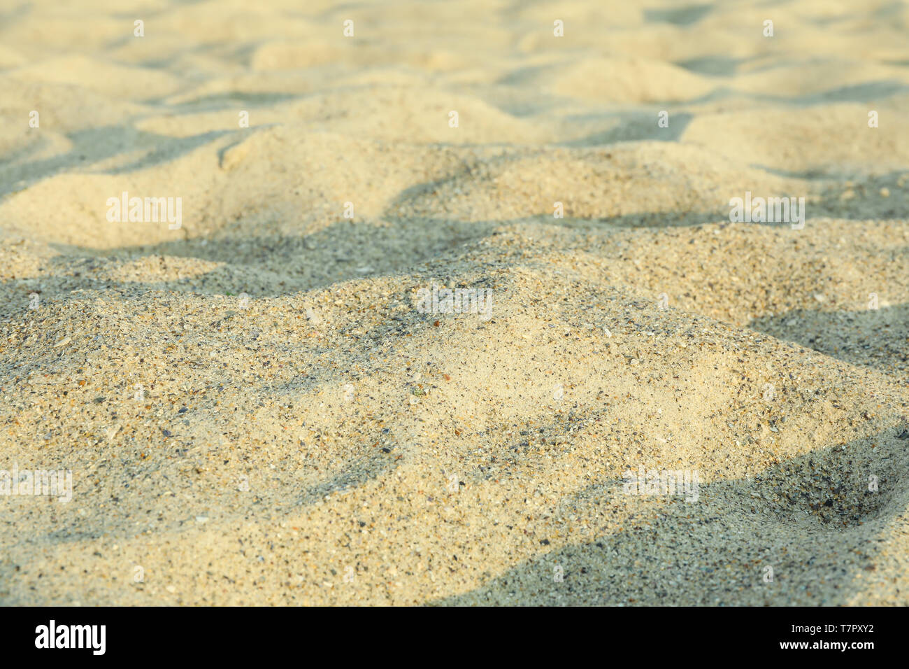 Sea sand as background, space for text. Summer backdrop Stock Photo - Alamy