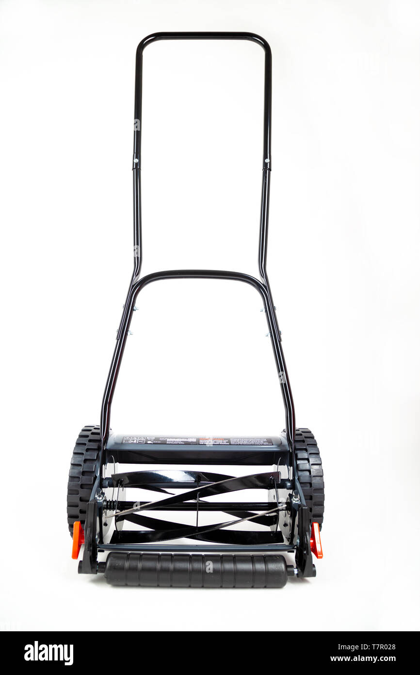 A push lawn mower photographed in a studio against a white background ...
