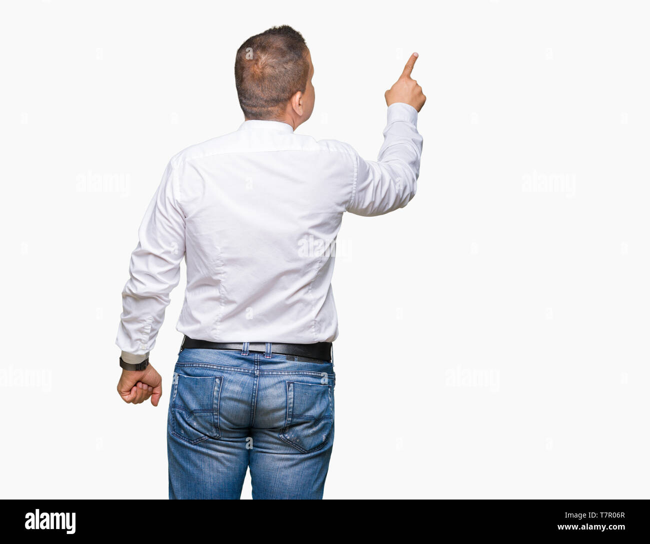 Middle age arab elegant man over isolated background Posing backwards ...