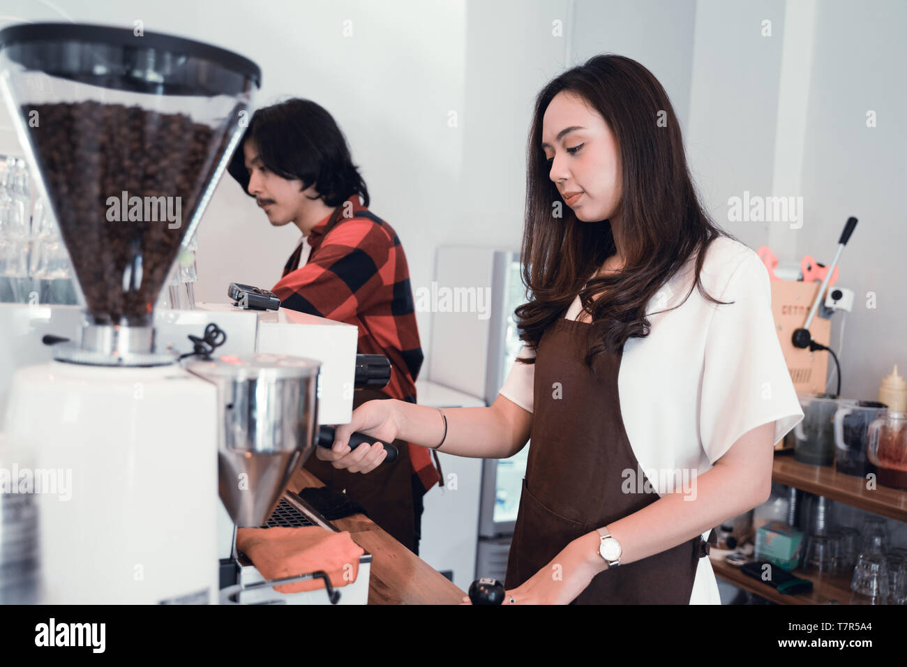 barista working together in kitchen Stock Photo - Alamy