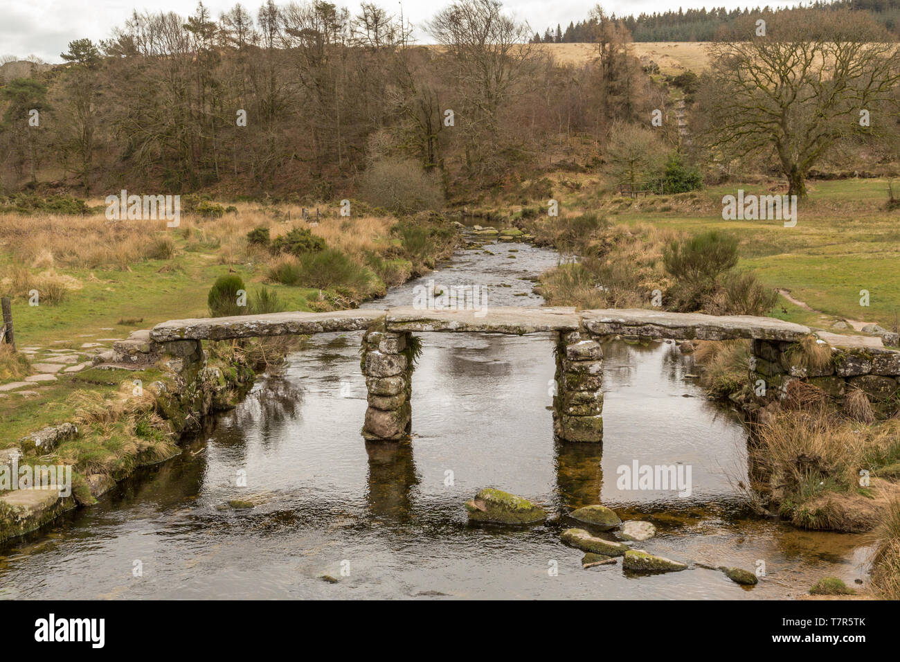 A front on shot of the historic Clapper Bridge made out of granite and ...