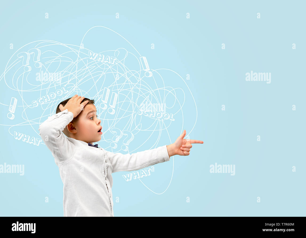 Young caucasian boy with mixed thoughts against blue background ...