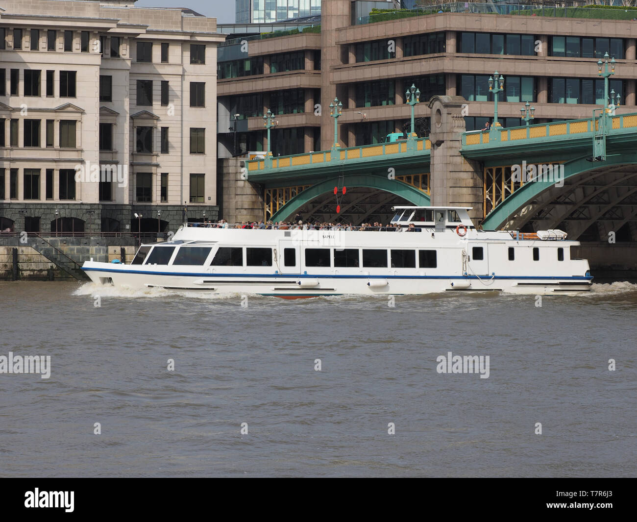 Sapele sightseeing boat on the River Thames, London, England, UK Stock ...