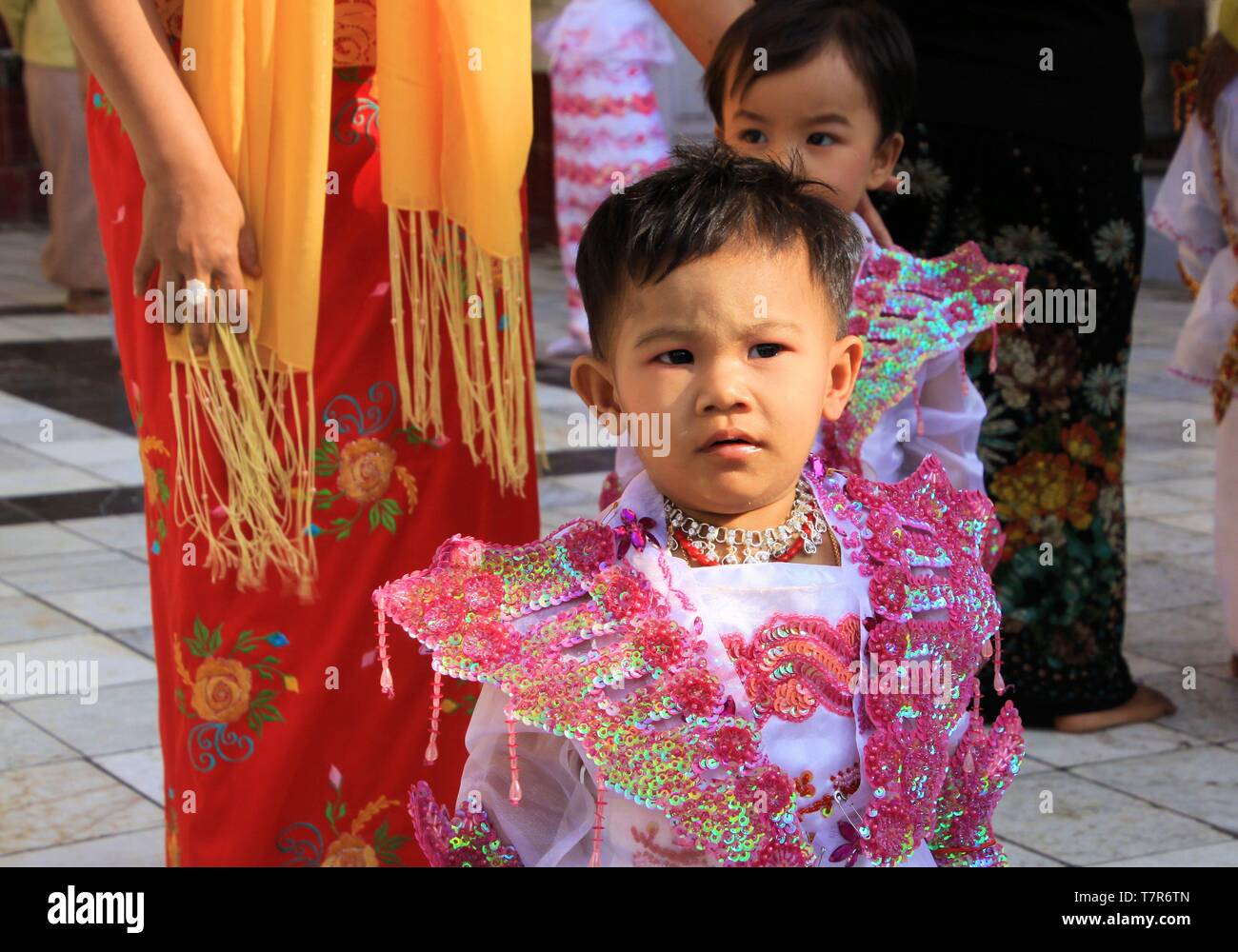 MANDALAY, MYANMAR - DECEMBER 18. 2015: Novitiation ceremony (Shinbyu ...