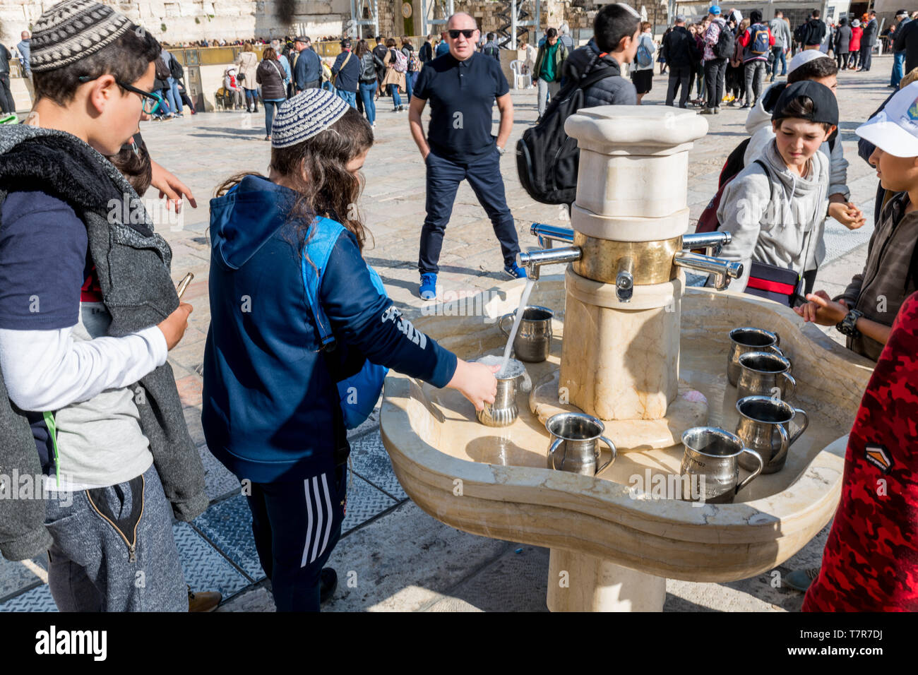 Cranes with water and special ritual Cups for washing hands beside the ...