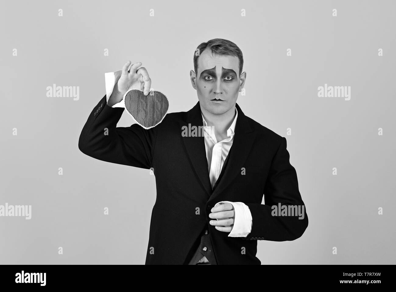 I love melancholy. Mime actor with love symbol. Mime man hold red heart ...