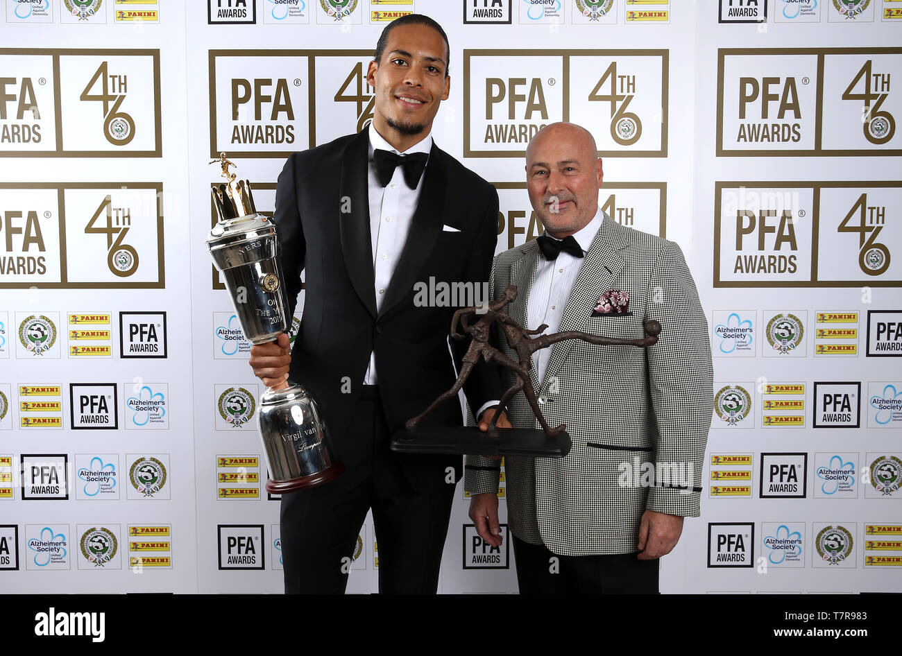 Liverpool's Virgil van Dijk (left) poses with his PFA Player of the ...