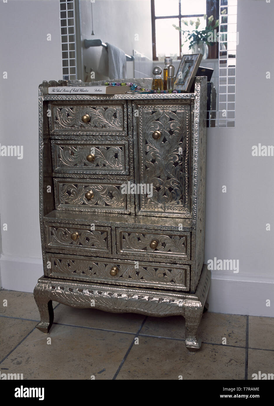 Close-up of ornate metalwork chest of drawers Stock Photo - Alamy
