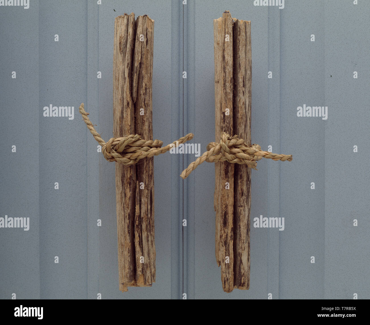 Close-up of rustic wood+string cupboard handles Stock Photo - Alamy