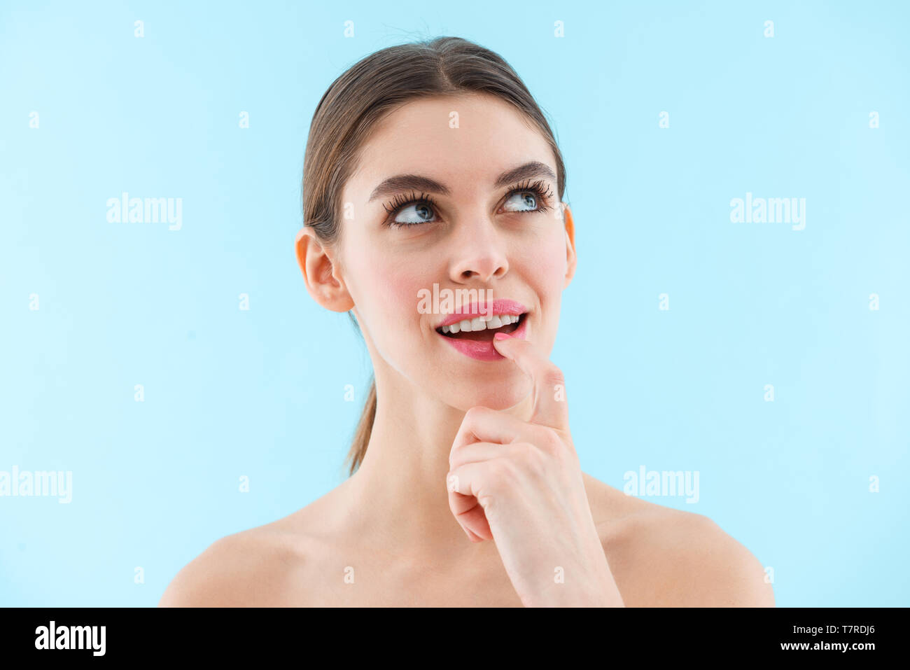 Image of a beautiful thinking thoughtful young pretty woman posing ...