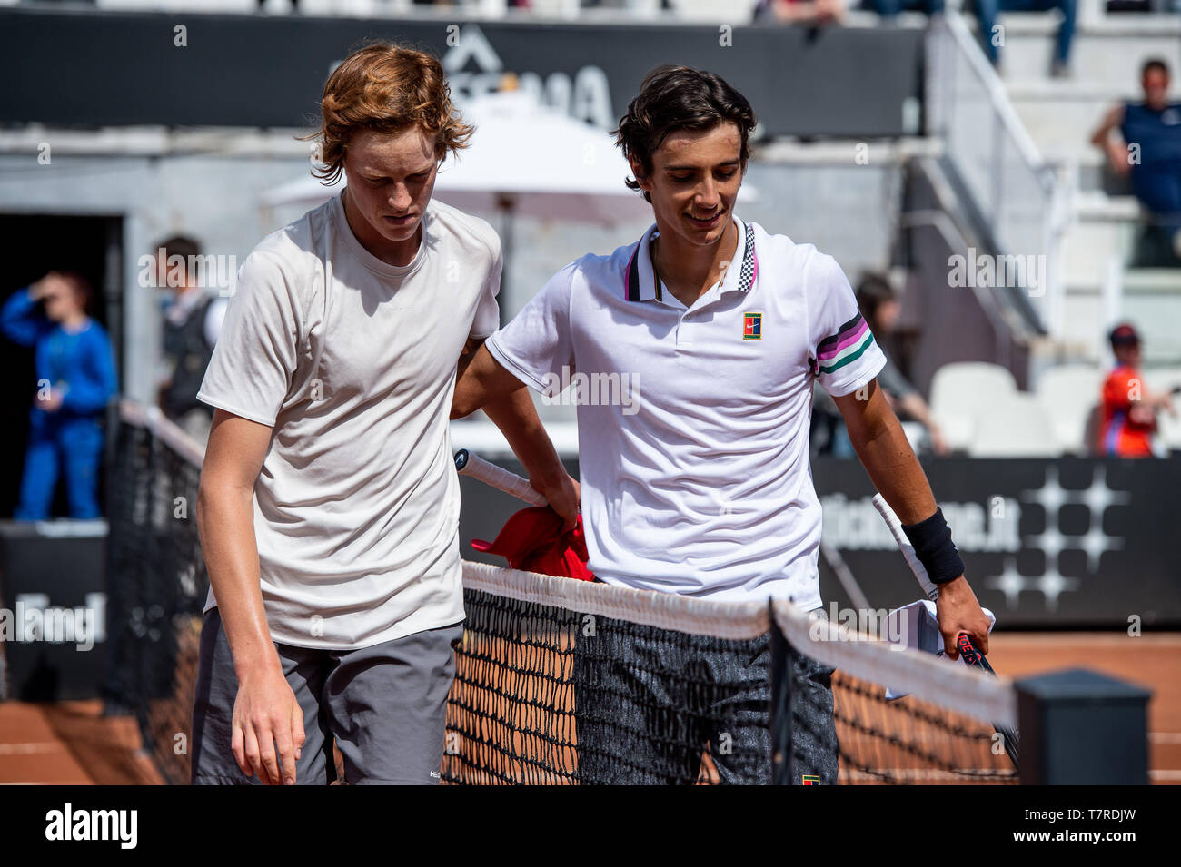 Lorenzo Musetti of Italy greets Jannik Sinner of Italy at the end of pre-qualification match ...