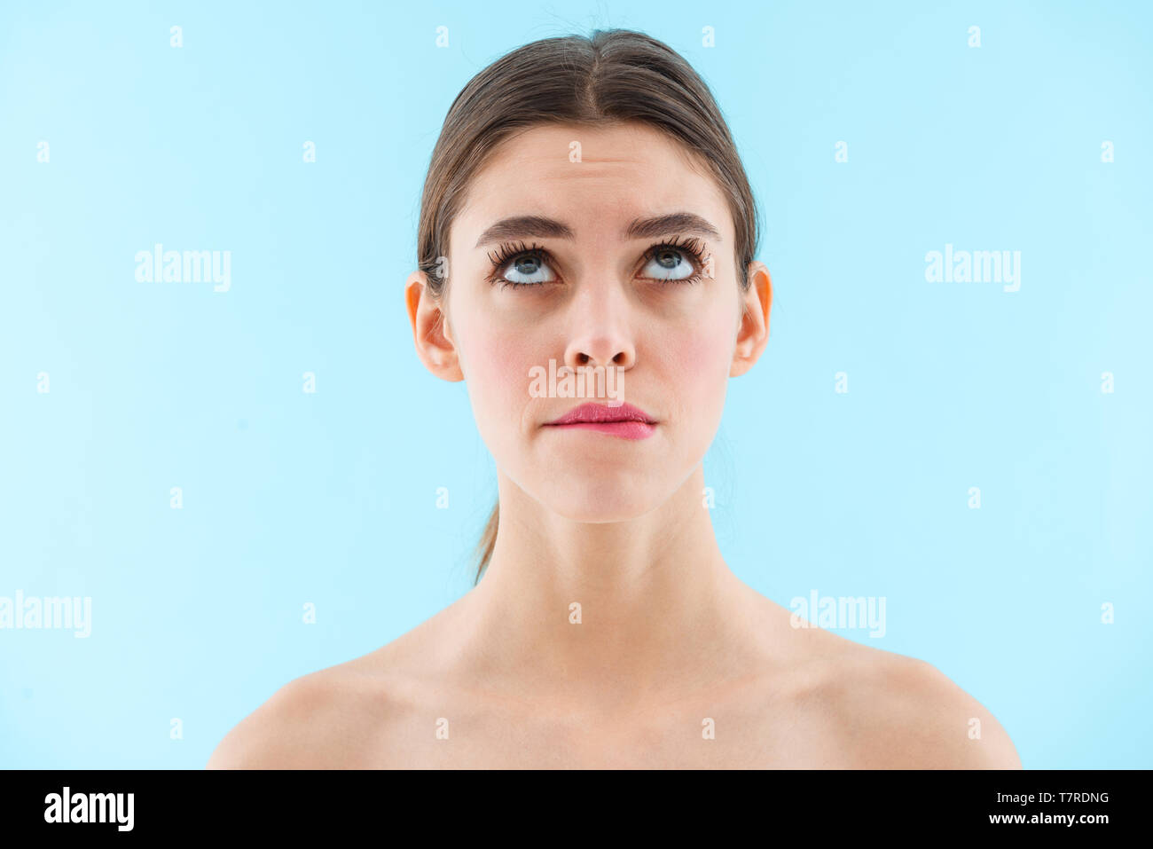 Image of a beautiful thinking thoughtful young pretty woman posing ...