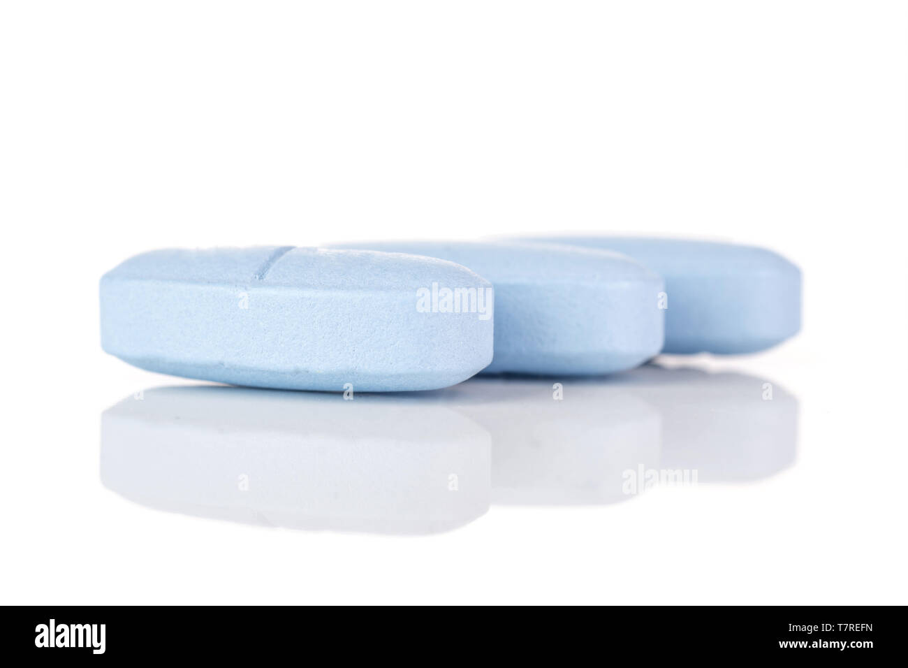 Group of three whole light blue medical drug isolated on white ...