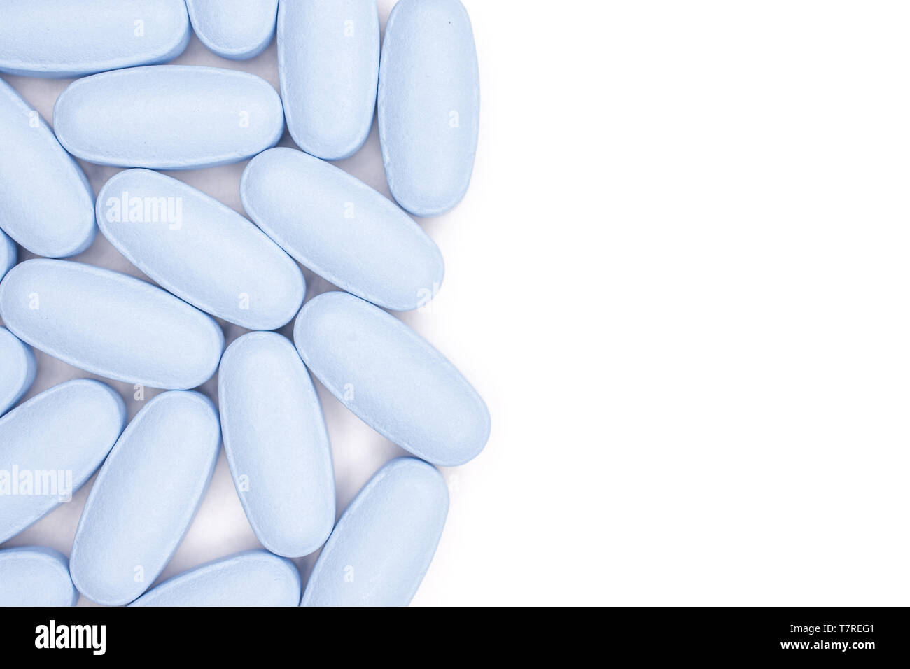 Lot of whole blue medical drug with copyspace flatlay isolated on white ...