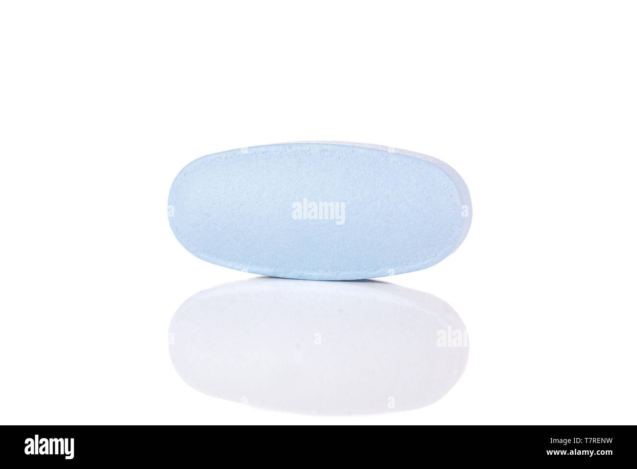 One whole light blue medical drug isolated on white background Stock ...
