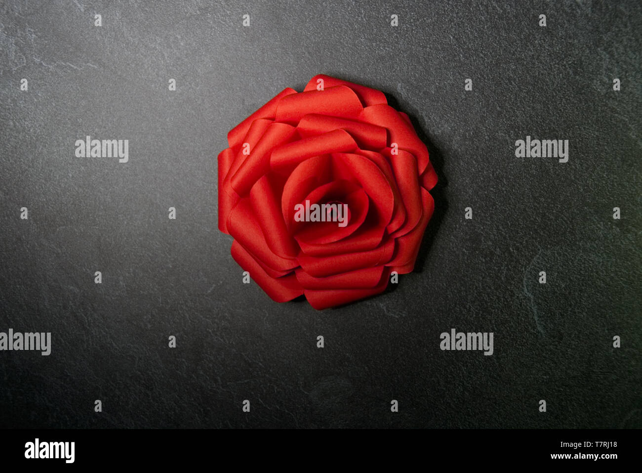 Red Origami Rose Blossom - Paper Art on Textured Background Stock Photo ...