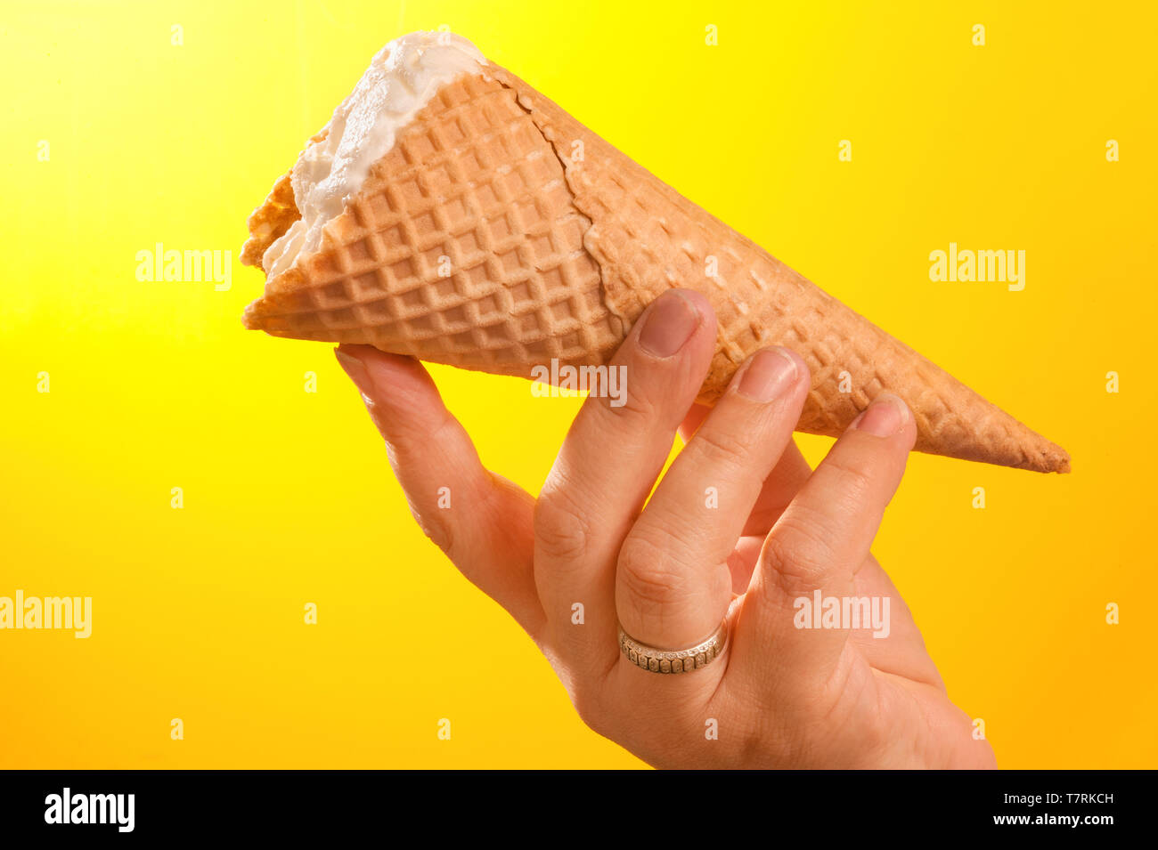 Ice cream cone in hand hi-res stock photography and images - Alamy