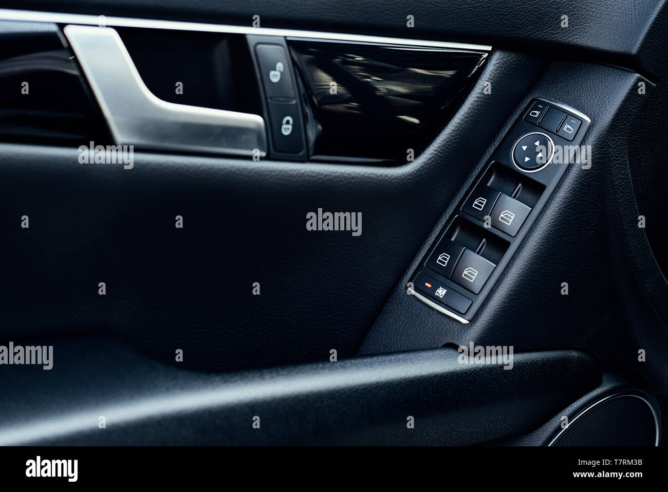Automatic control panel of car windows, close up Stock Photo - Alamy