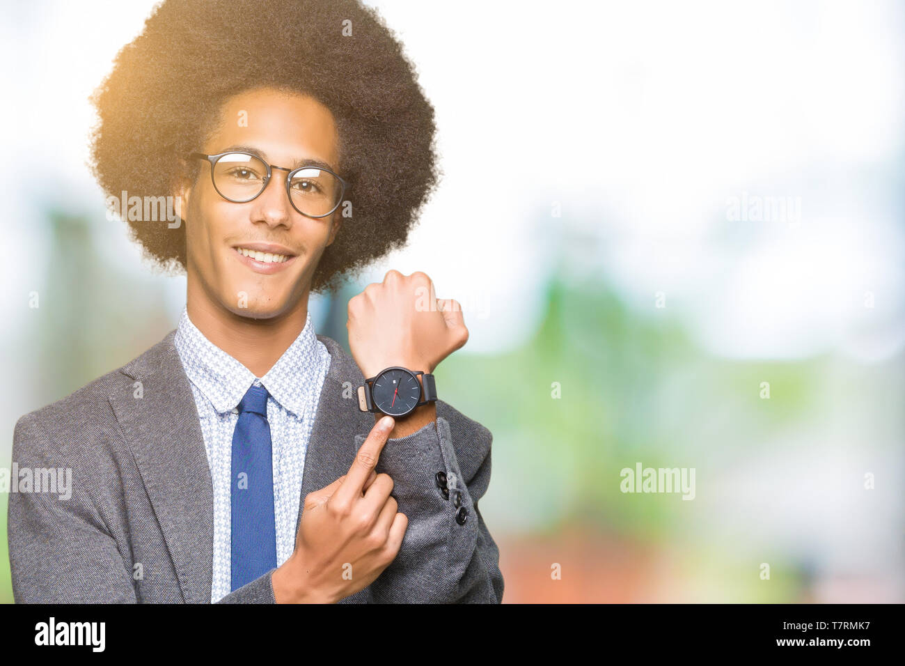 Young african american business man with afro hair wearing glasses In ...