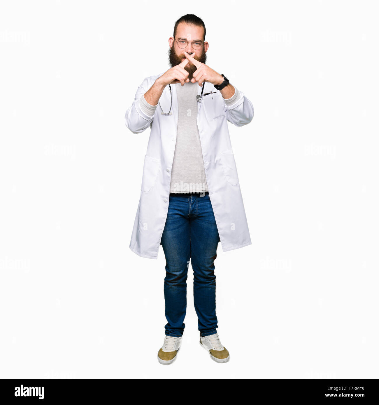 Young blond doctor man with beard wearing medical coat Rejection ...