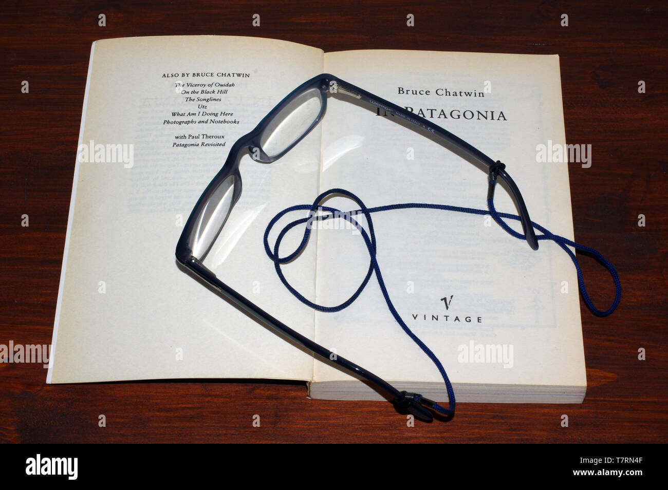 In Patagonia by Bruce Chatwin, open book with eye-glasses close-up ...