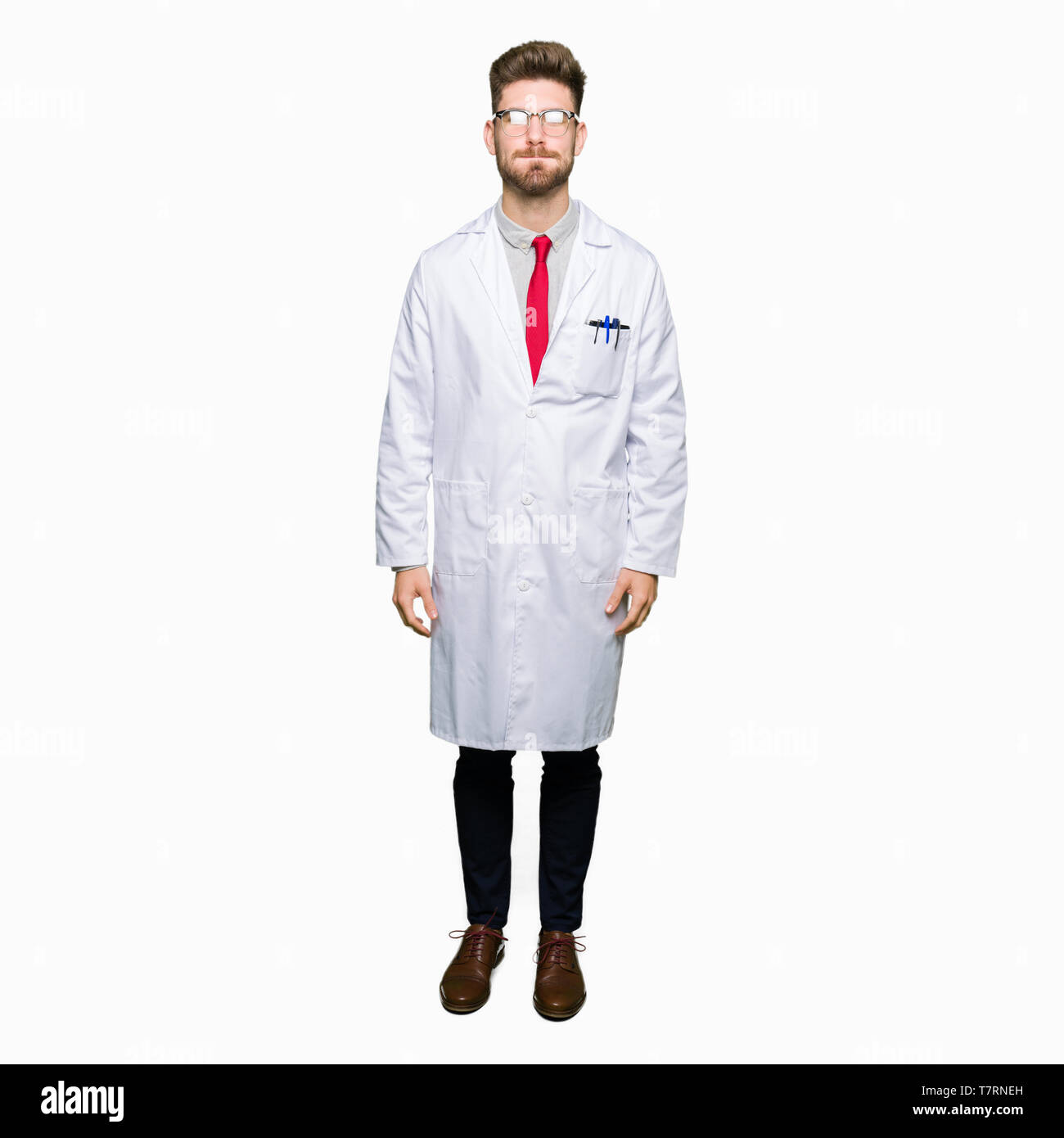 Young handsome scientist man wearing glasses puffing cheeks with funny ...