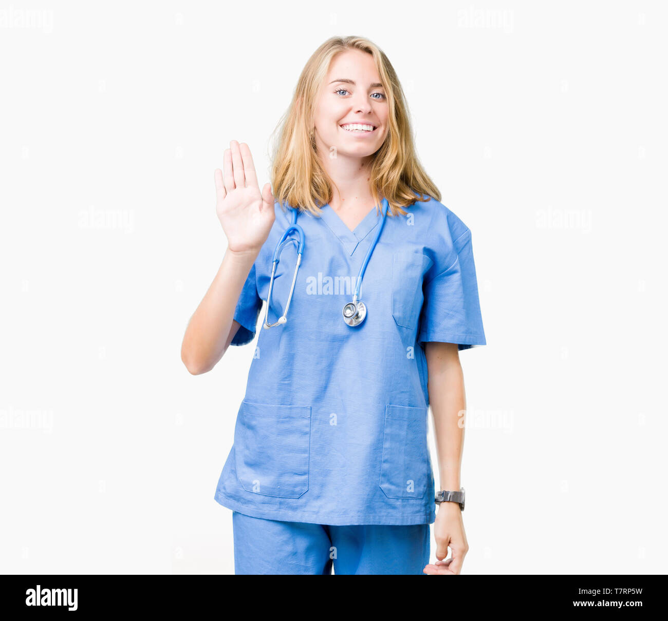 Beautiful young doctor woman wearing medical uniform over isolated ...