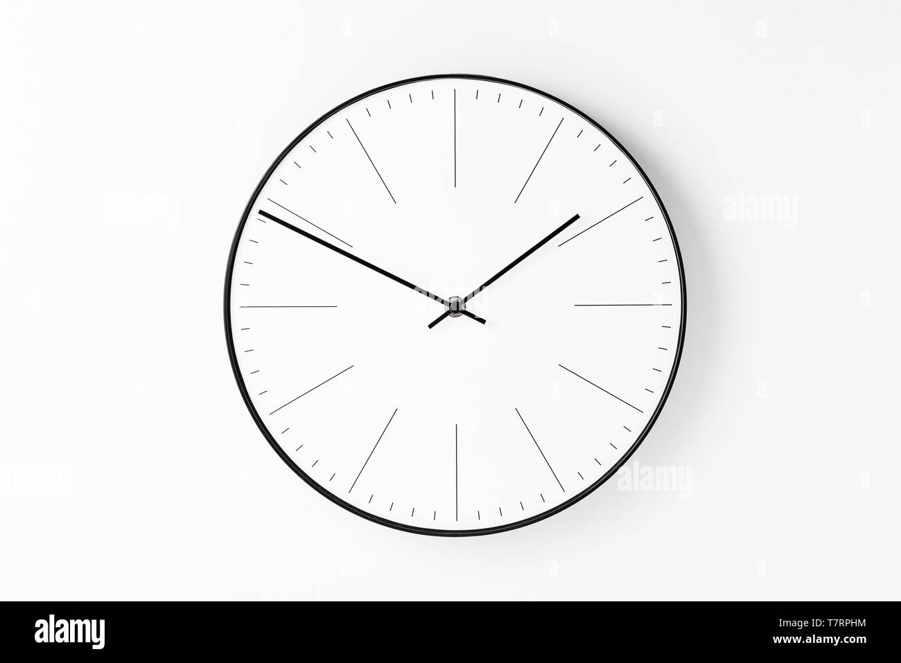 Round wall clock on white background. Minimal creativity concept Stock ...