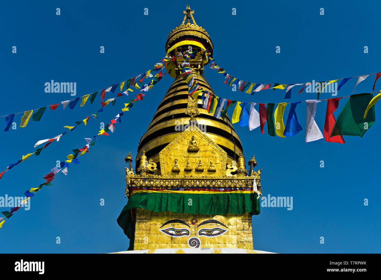 Gilded spire on which are painted the Buddha's eyes, Swayambhunath ...